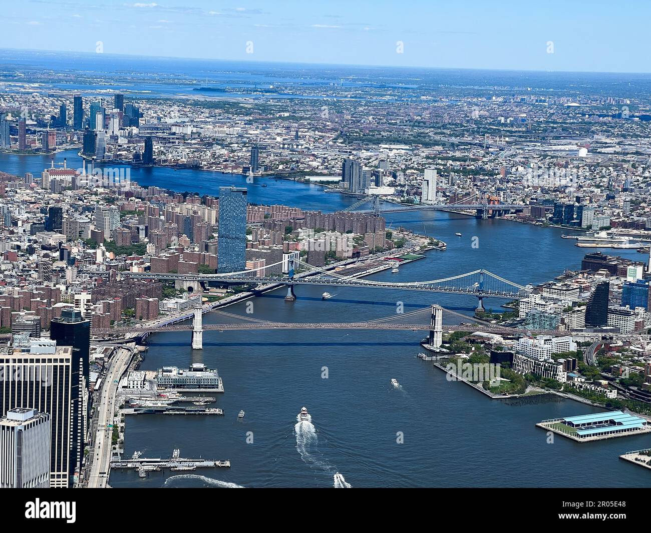 Aerial view of Brooklyn Bridge and Manhattan Bridge in New York City on ...