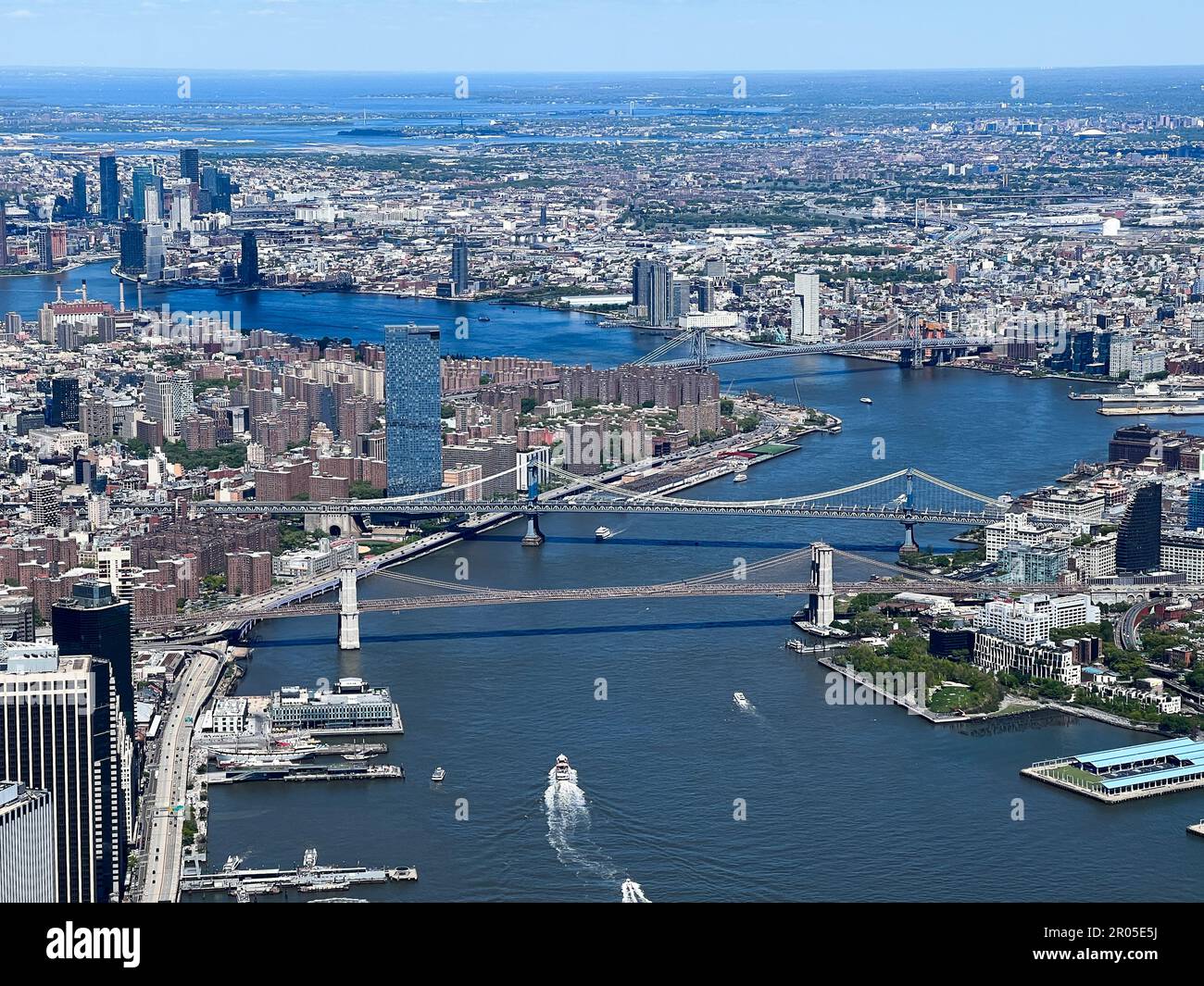 Aerial view of Brooklyn Bridge and Manhattan Bridge in New York City on ...