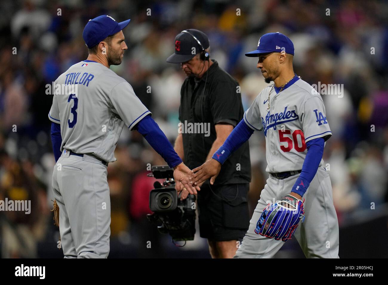 Los Angeles Dodgers shortstop Chris Taylor, left, celebrates with right ...