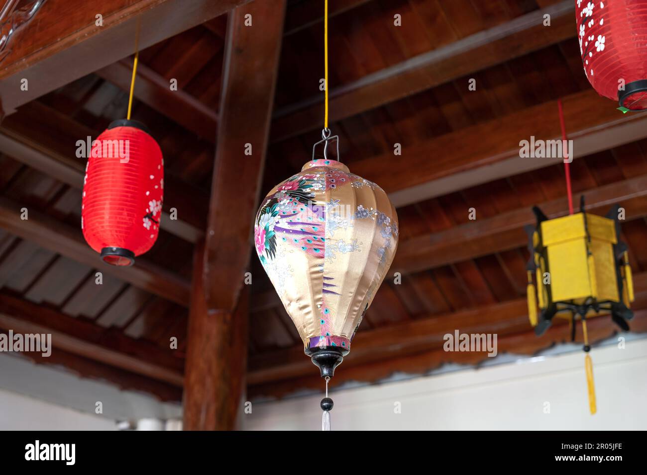 Red lanterns hanging from ceiling hi-res stock photography and images ...
