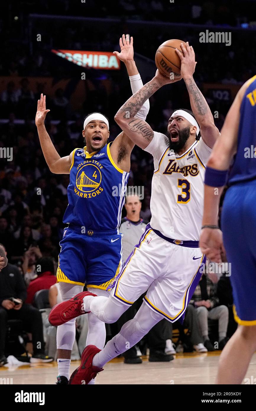 Los Angeles Lakers forward Anthony Davis, right, shoots as Golden State ...