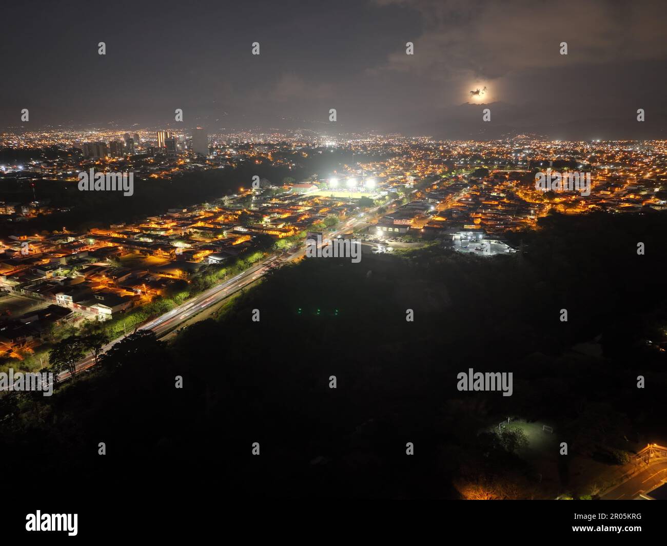 Experience the enchanting sight of the full moon rising over the iconic ...