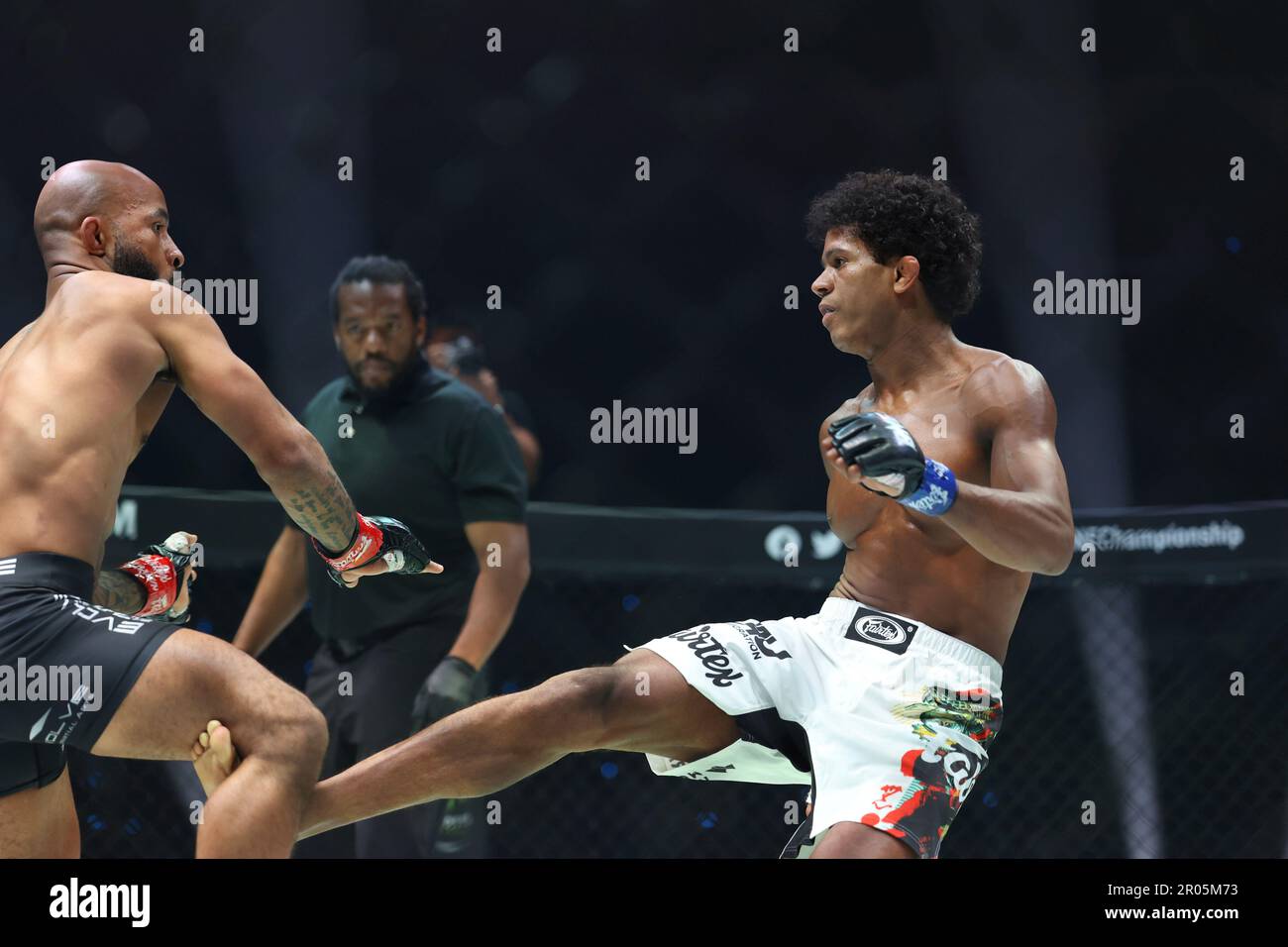 DENVER, COLORADO - MAY 5: (L-R) Demetrious Johnson checks Adriano ...
