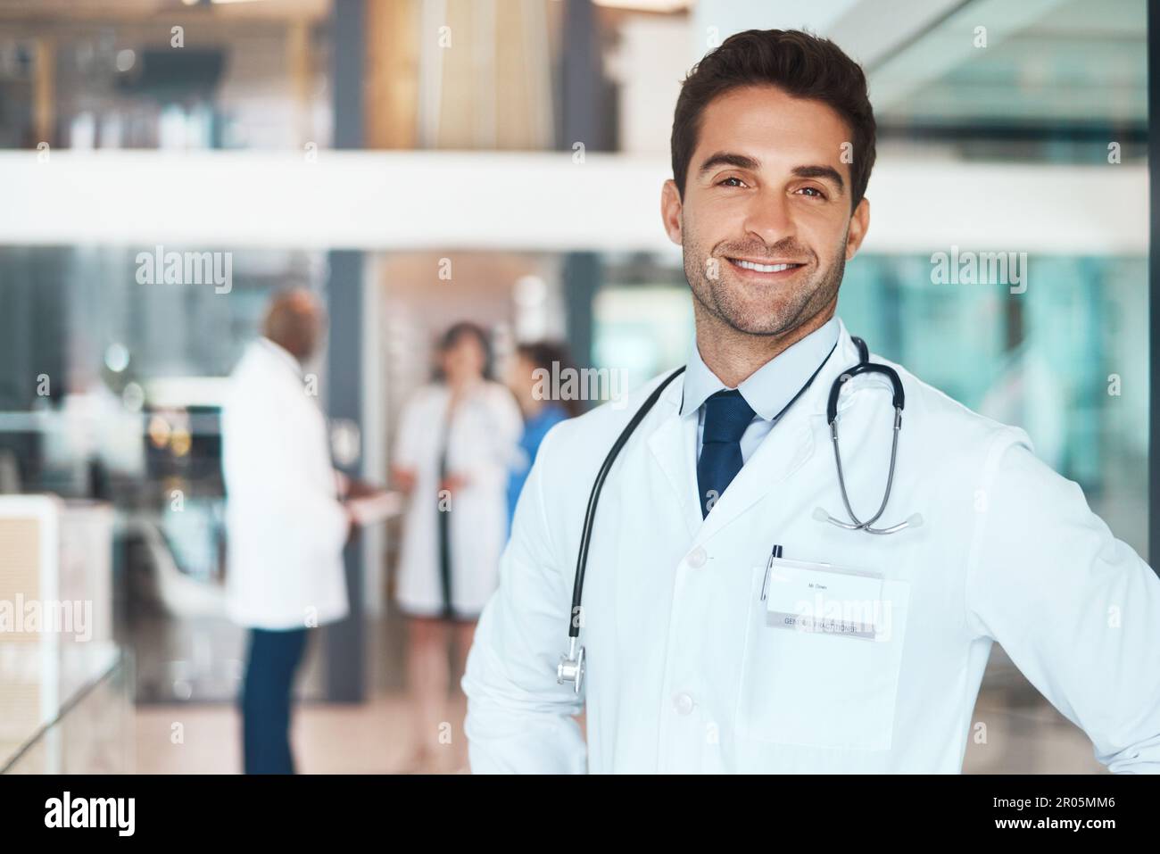 What can I do to make you feel better. Portrait of a confident doctor ...