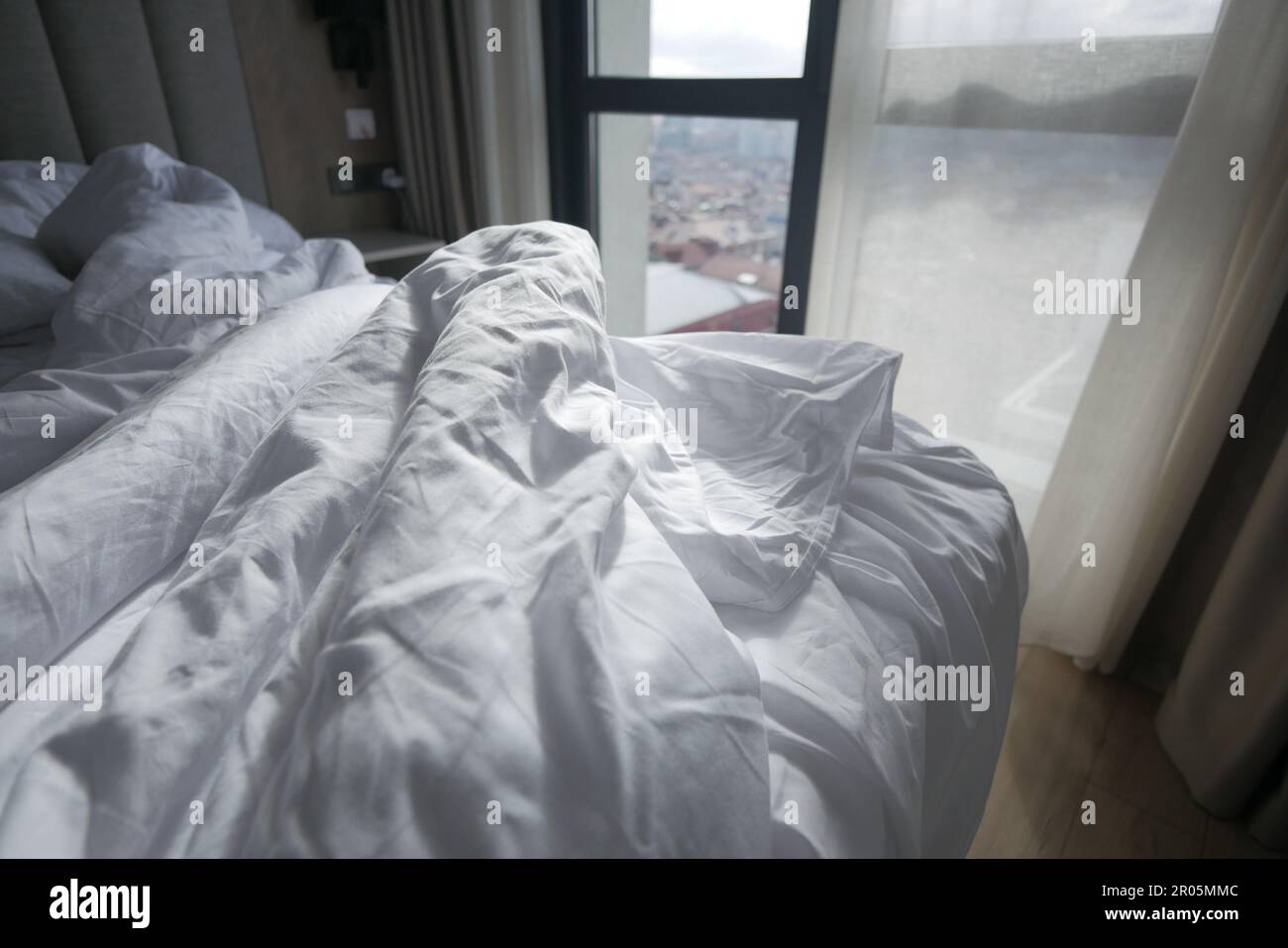 messy bed in early morning , messy bed after waking up Stock Photo - Alamy