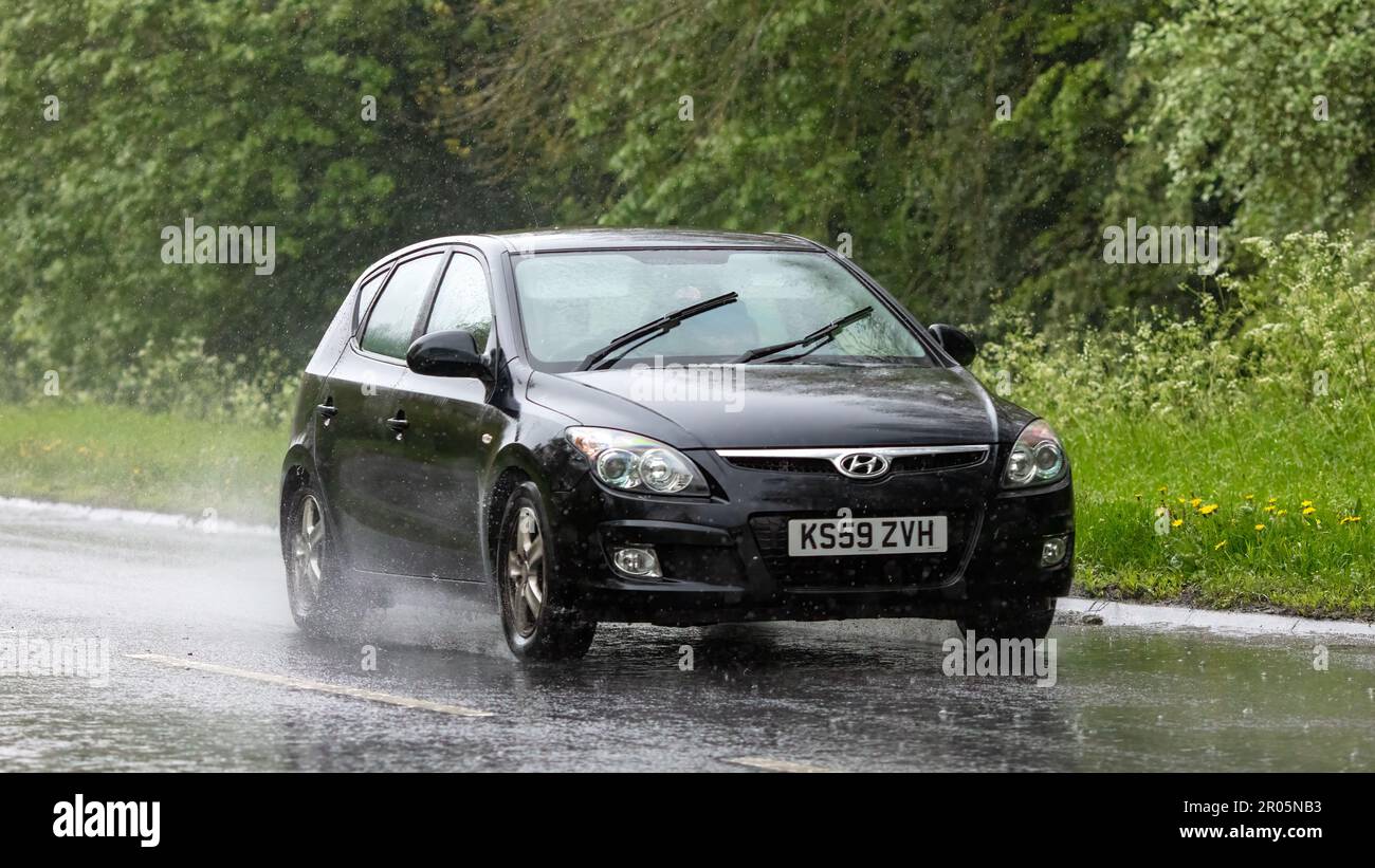Stony Stratford,Bucks,UK - May 6th 2023. 2010 black HYUNDAI I30 driving ...
