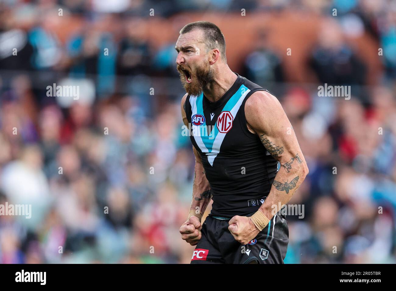 Charlie Dixon of the Power celebrates a goal during the AFL Round 8 ...