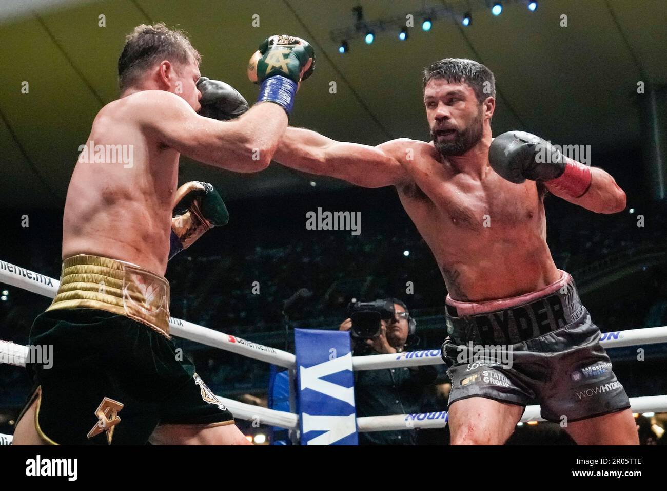 John Ryder of Britain, right, fights against Saul "Canelo" Alvarez of ...