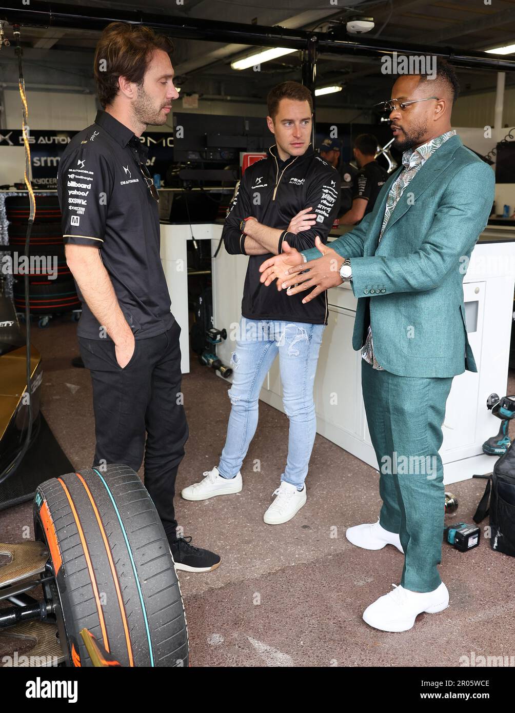 Patrice Evra, Jean Eric Vergne pose along the pit lane of Monaco E-Prix ...