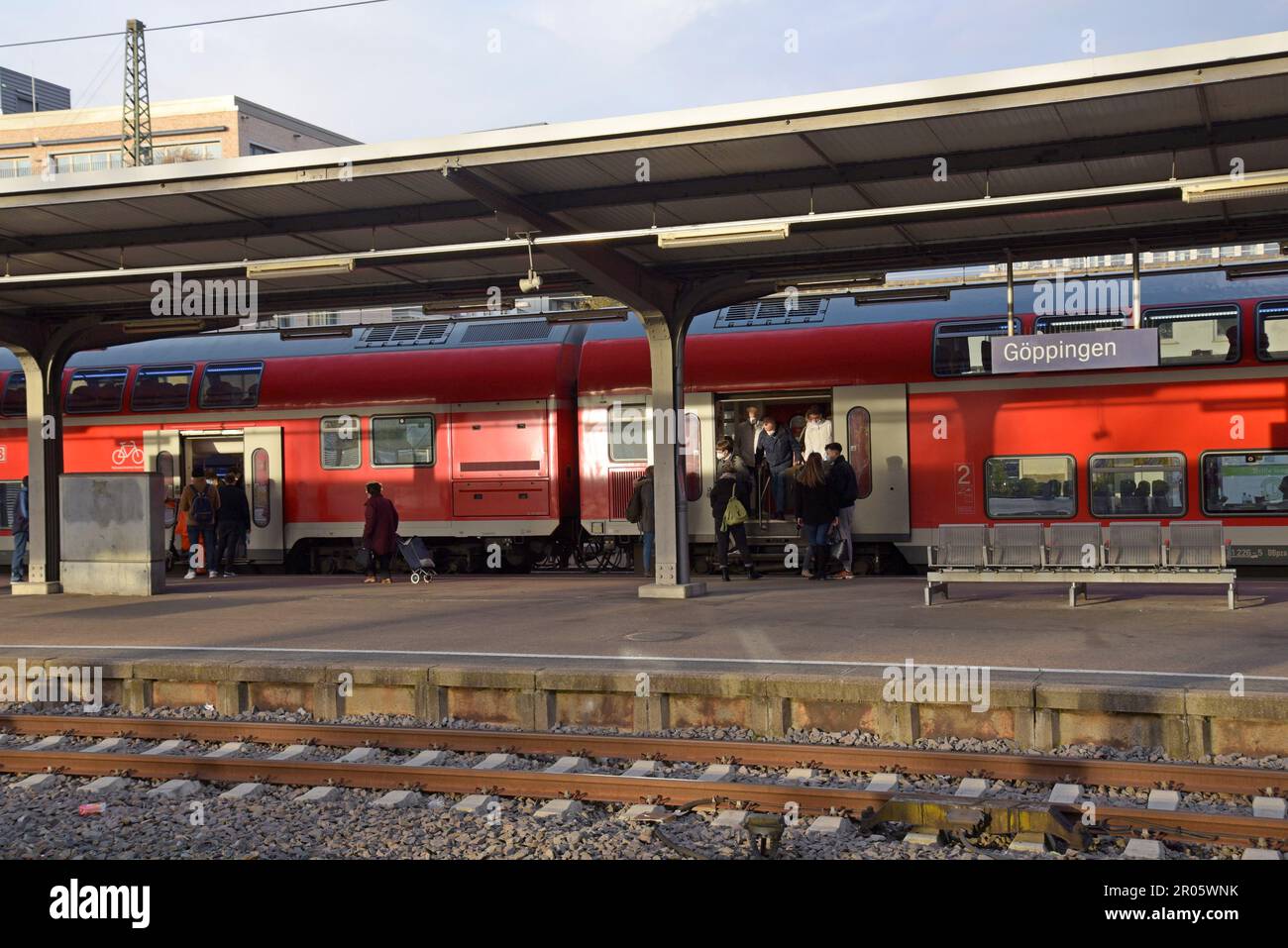 Passengers getting on a German Railways Deutsch Bahn regional train at ...
