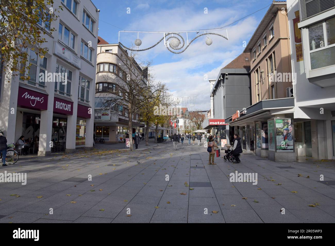 People walking and shopping in the pedestrianised city centre streets ...