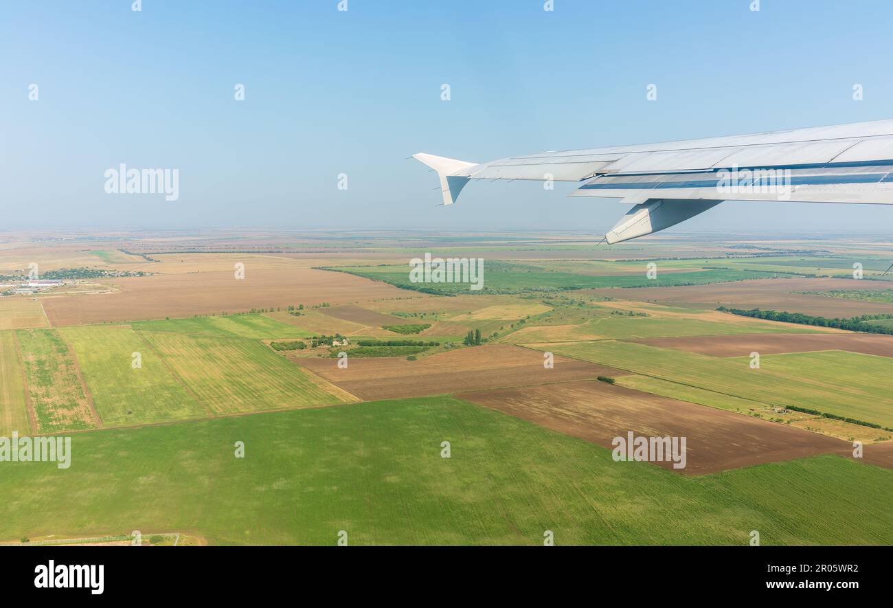 View from the airplane window during takeoff at Koltsovo airport on a ...