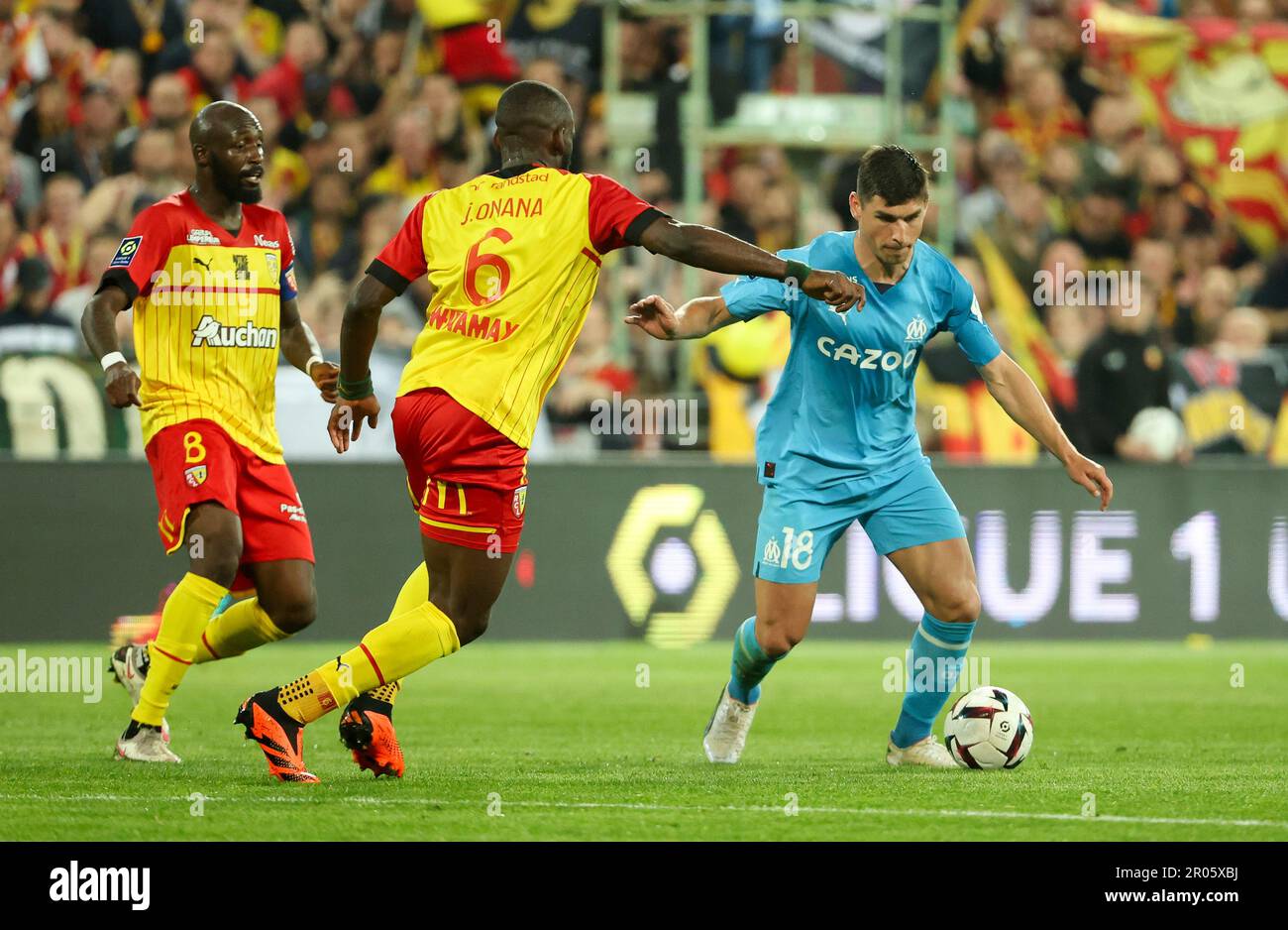 Lens, France. 06th May, 2023. Ruslan Malinovskyi of Marseille, left Seko Fofana of Lens during ...