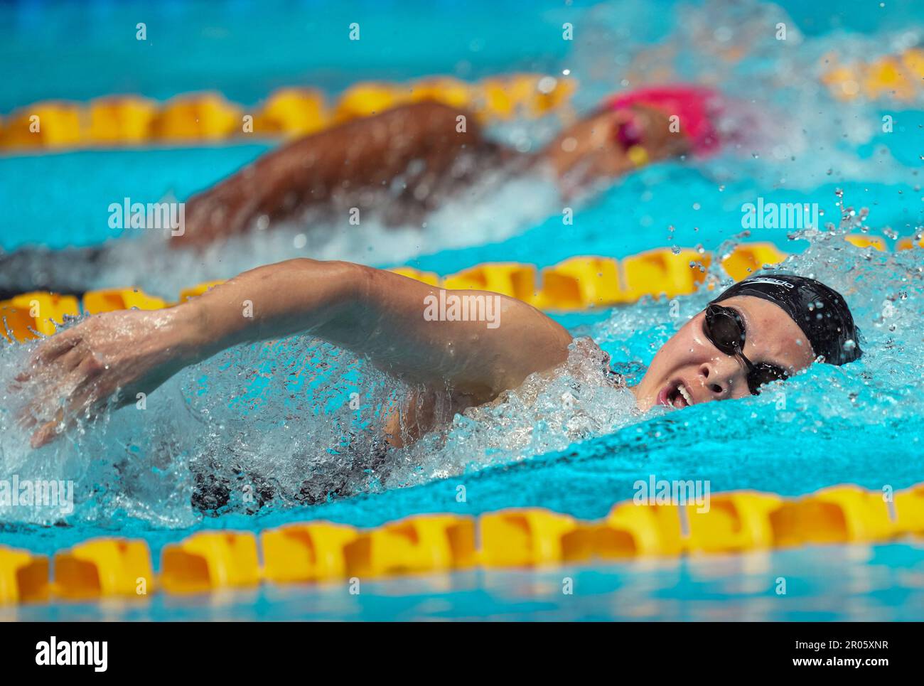 Singapore's Enyisim Letitia swims in her heat of the women's 200m ...