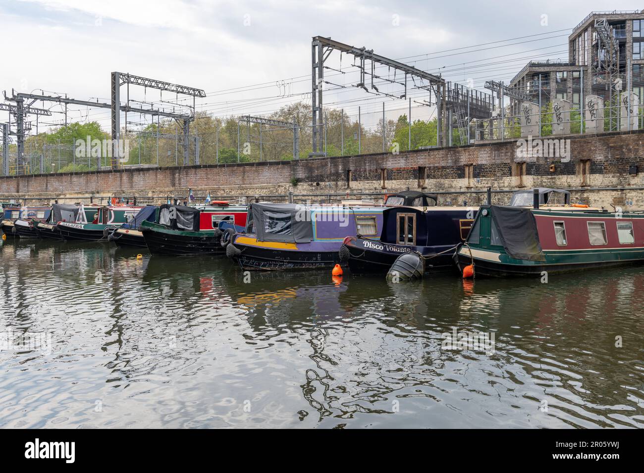 London. UK- 05.04.2023. Moored canal barges in St Pancras Basin off ...