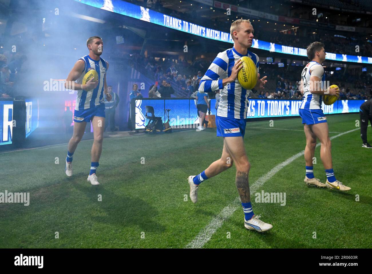 Jaidyn Stephenson of the Kangaroos takes to the field ahead of the AFL ...