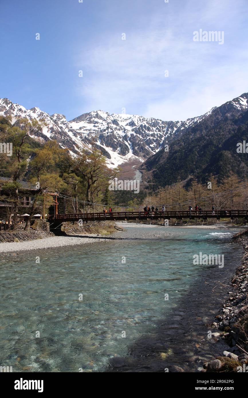 The clear Azusa River, snow-capped Mount Hotaka and Kappa-bashi, in ...