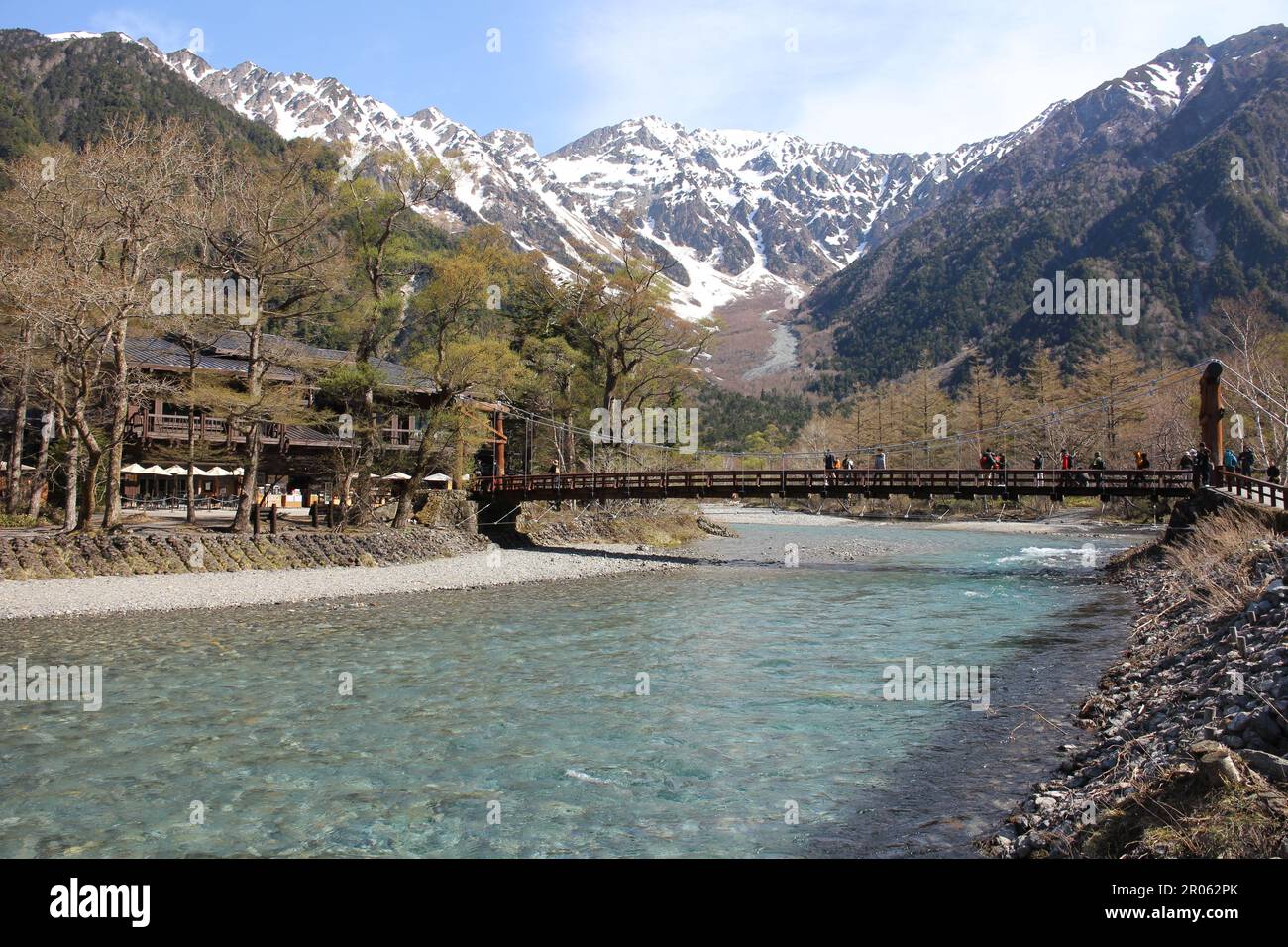 The clear Azusa River, snow-capped Mount Hotaka and Kappa-bashi, in ...