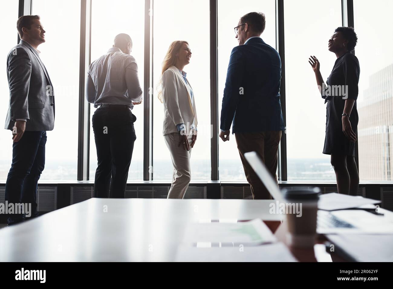 The future looks bright. Low angle shot of a group of corporate ...
