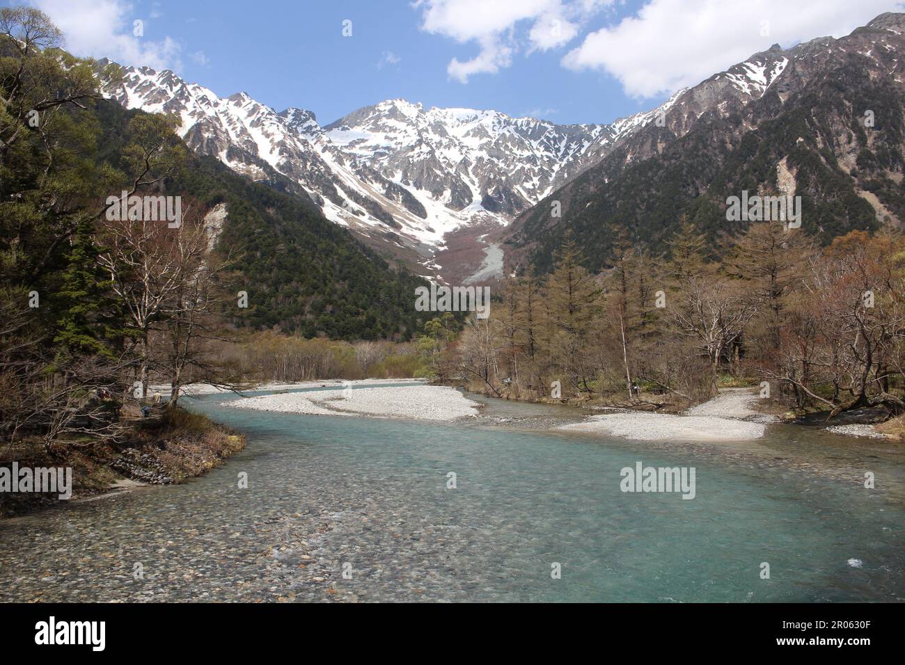 The clear Azusa River and snow-capped Mount Hotaka viewed from Kappa ...