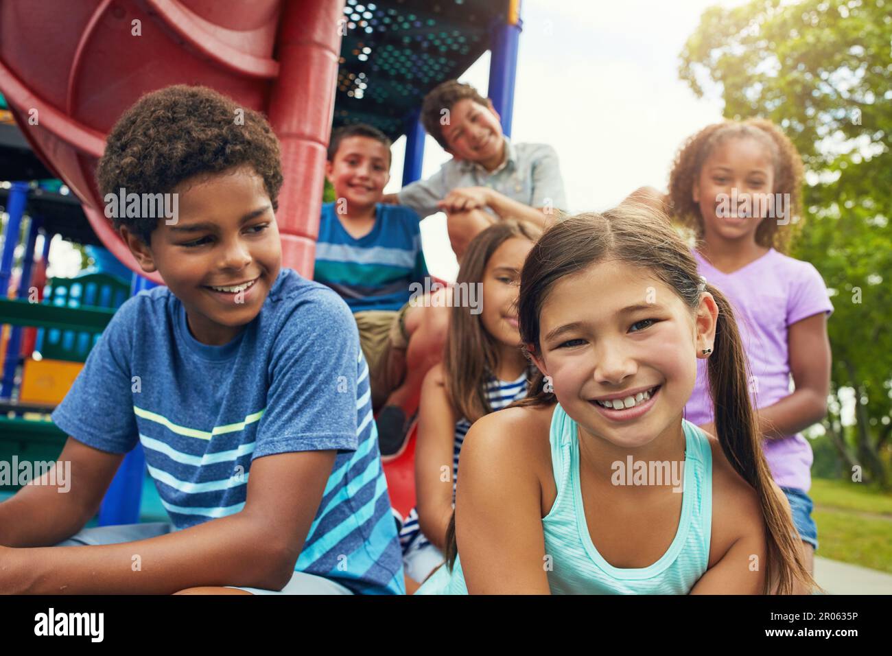 And now, we play. a group of young friends hanging out together at a ...