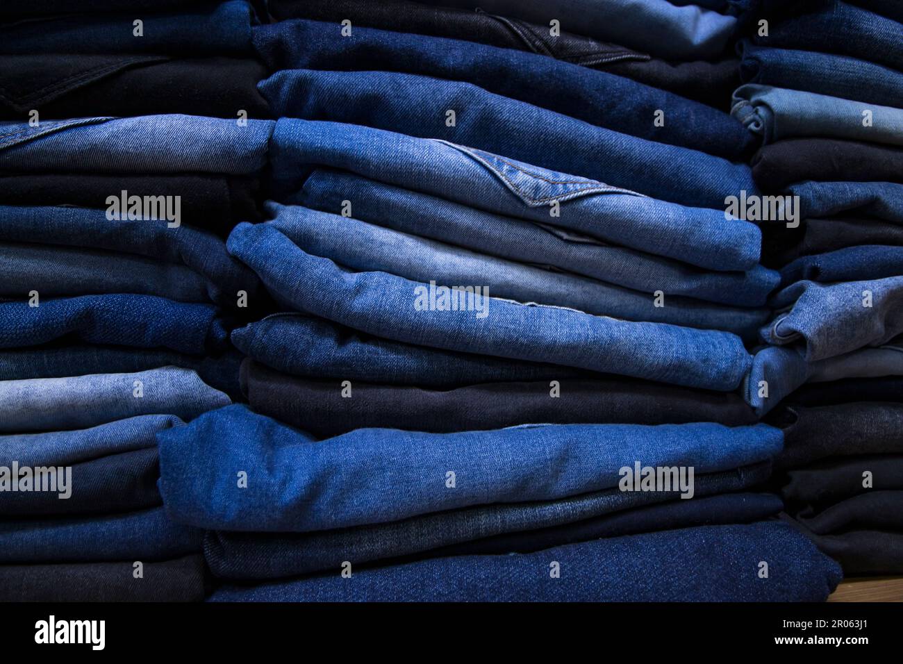 folded blue jeans pant pattern texture can be used as a background ...