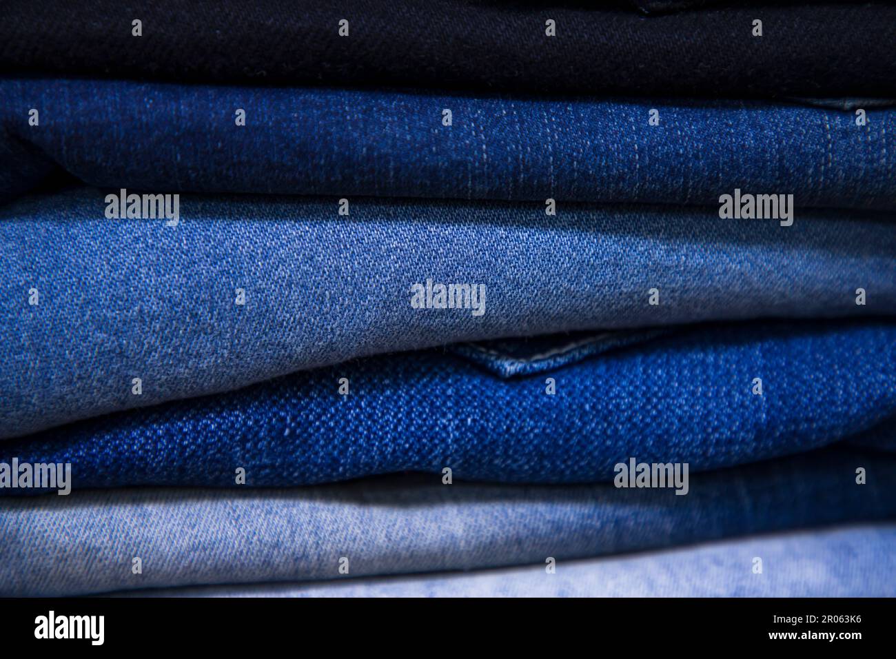 folded blue jeans pant pattern texture can be used as a background ...