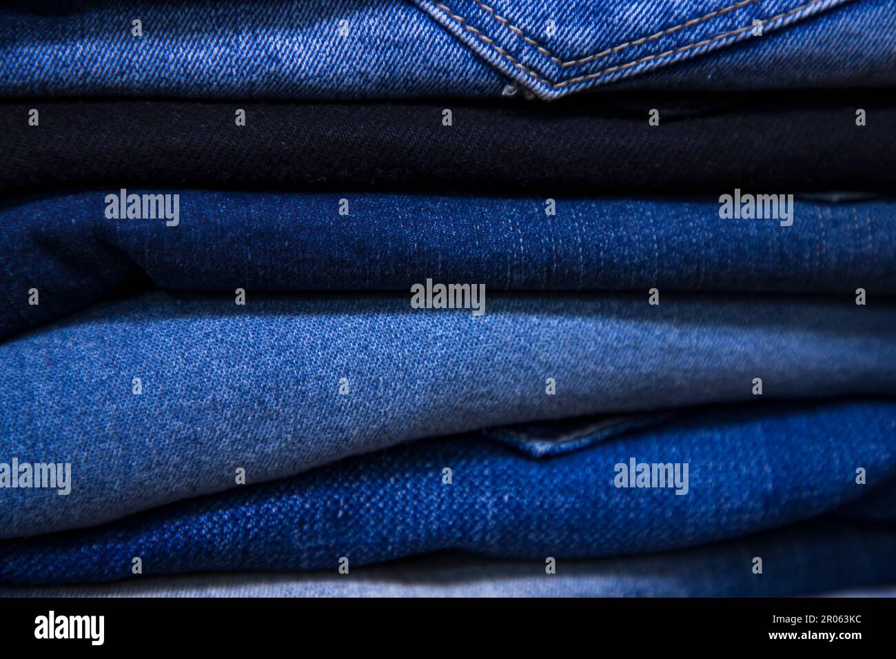 folded blue jeans pant pattern texture can be used as a background ...