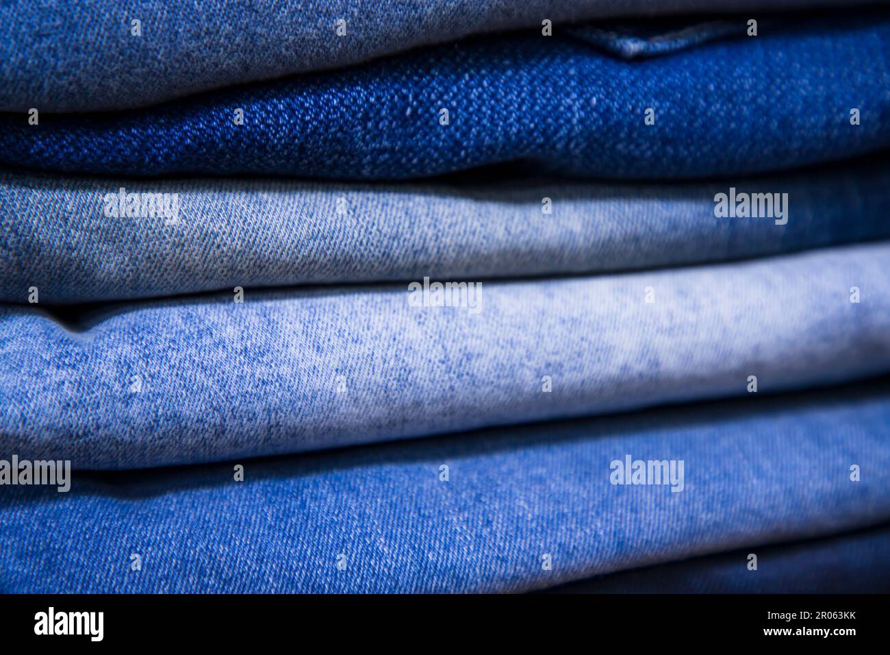 folded blue jeans pant pattern texture can be used as a background ...