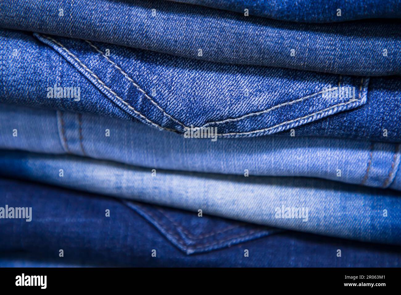 folded blue jeans pant pattern texture can be used as a background ...