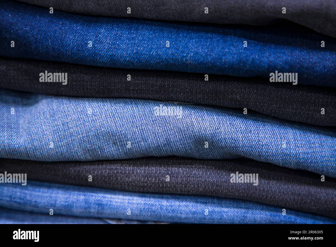 folded blue jeans pant pattern texture can be used as a background ...
