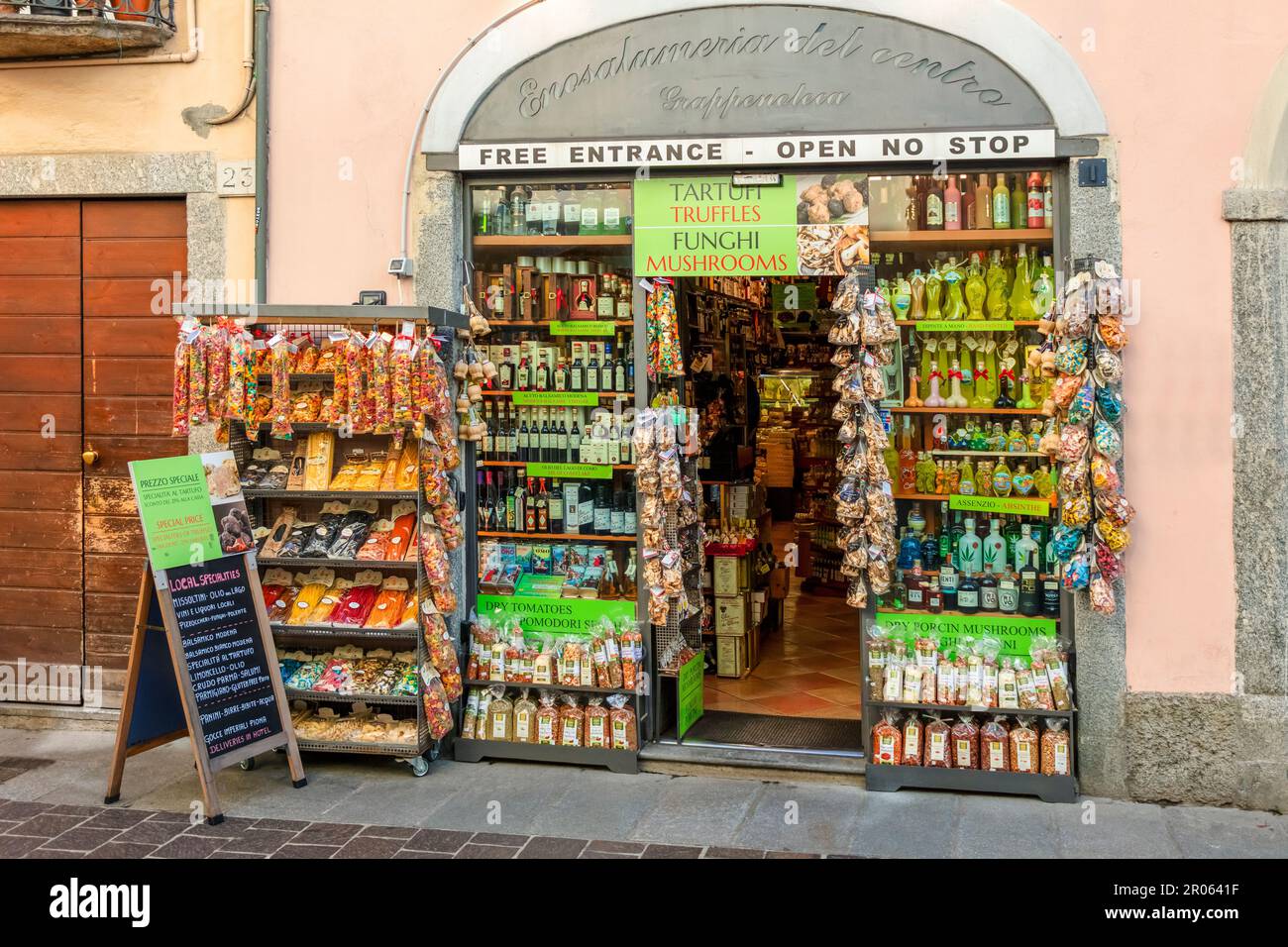 Specialty shop in an old town alley, Como, Lake Como, Lombardy, Italy ...
