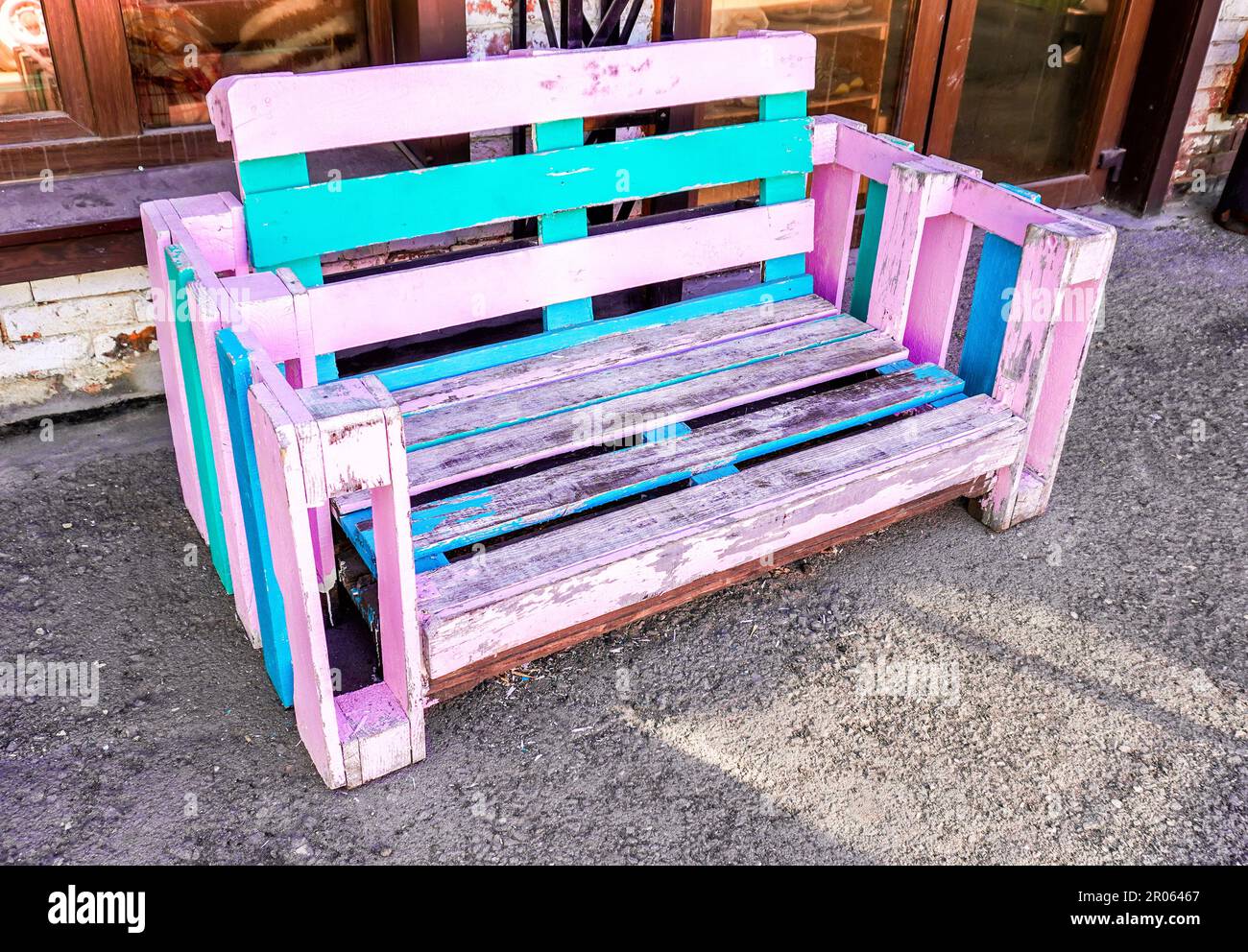 Creative colorful bench made from wooden pallets Stock Photo - Alamy