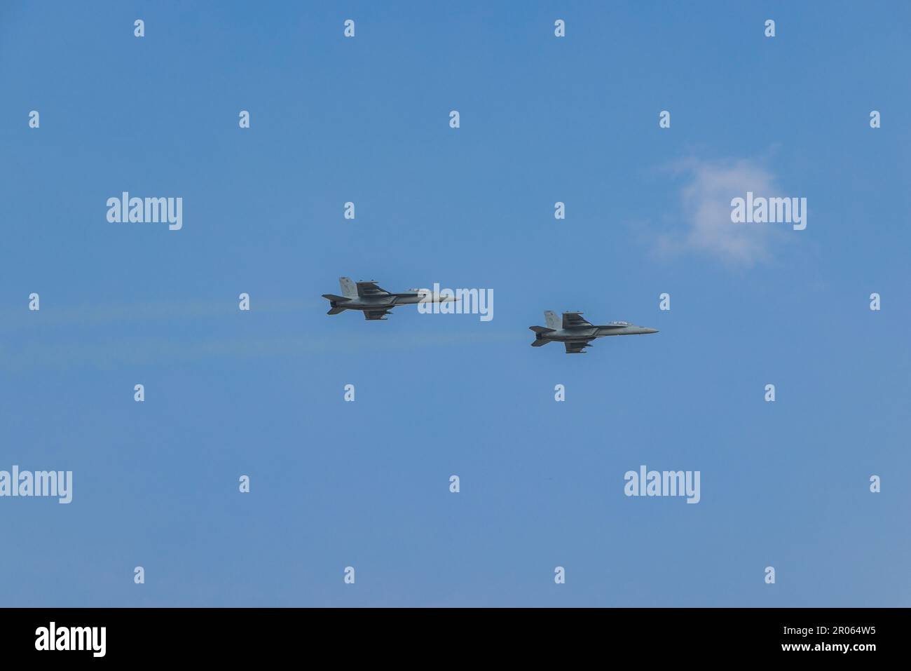 Two Boeing EA-18G fighter jets doing fly-bys at EAA AirVenture against ...
