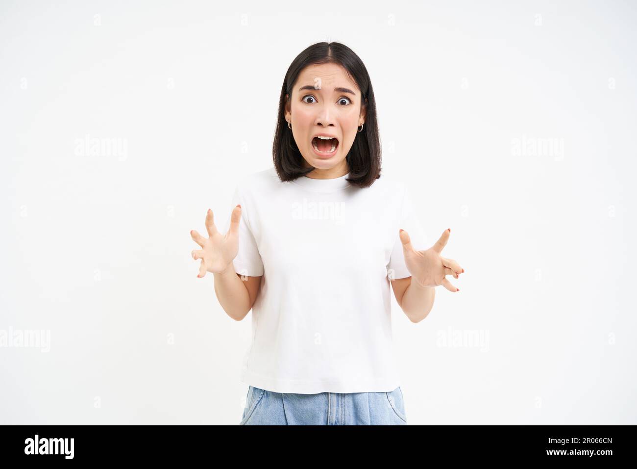 Image of scared asian woman, looking worried and concerned, terrified ...
