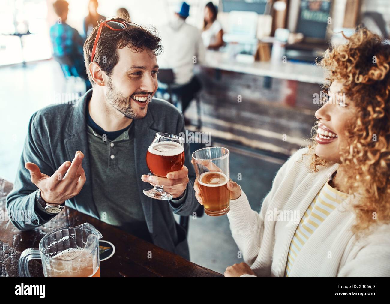 Introductions are in order. a happy young man and woman toasting with ...