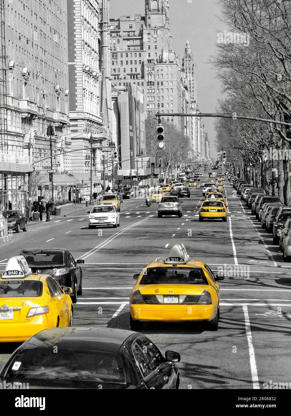 Classic New York Manhattan Street with all colour removed except the iconic yellow of the taxis ...