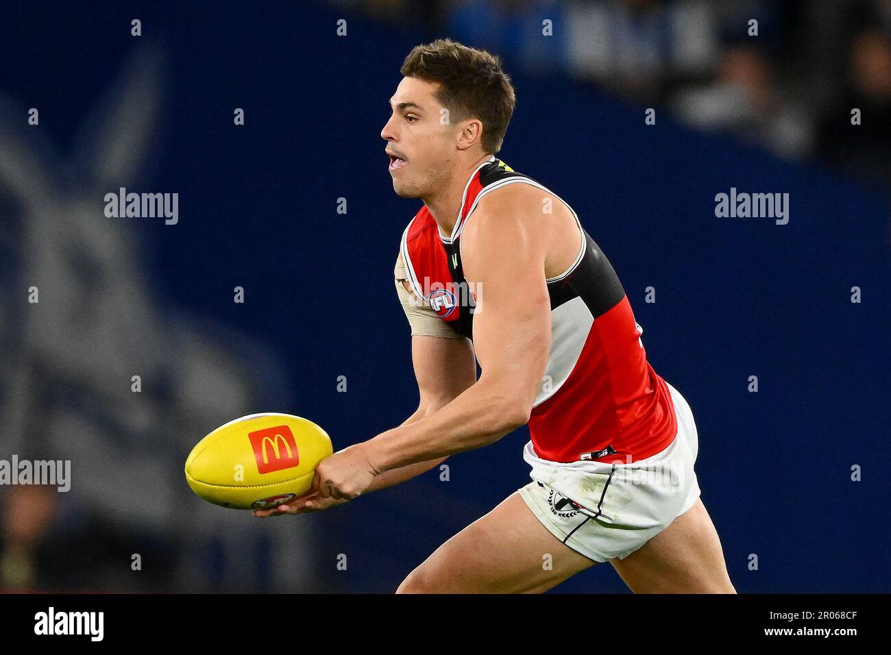 Jack Steele of the Saints handballs during the AFL Round 8 match ...