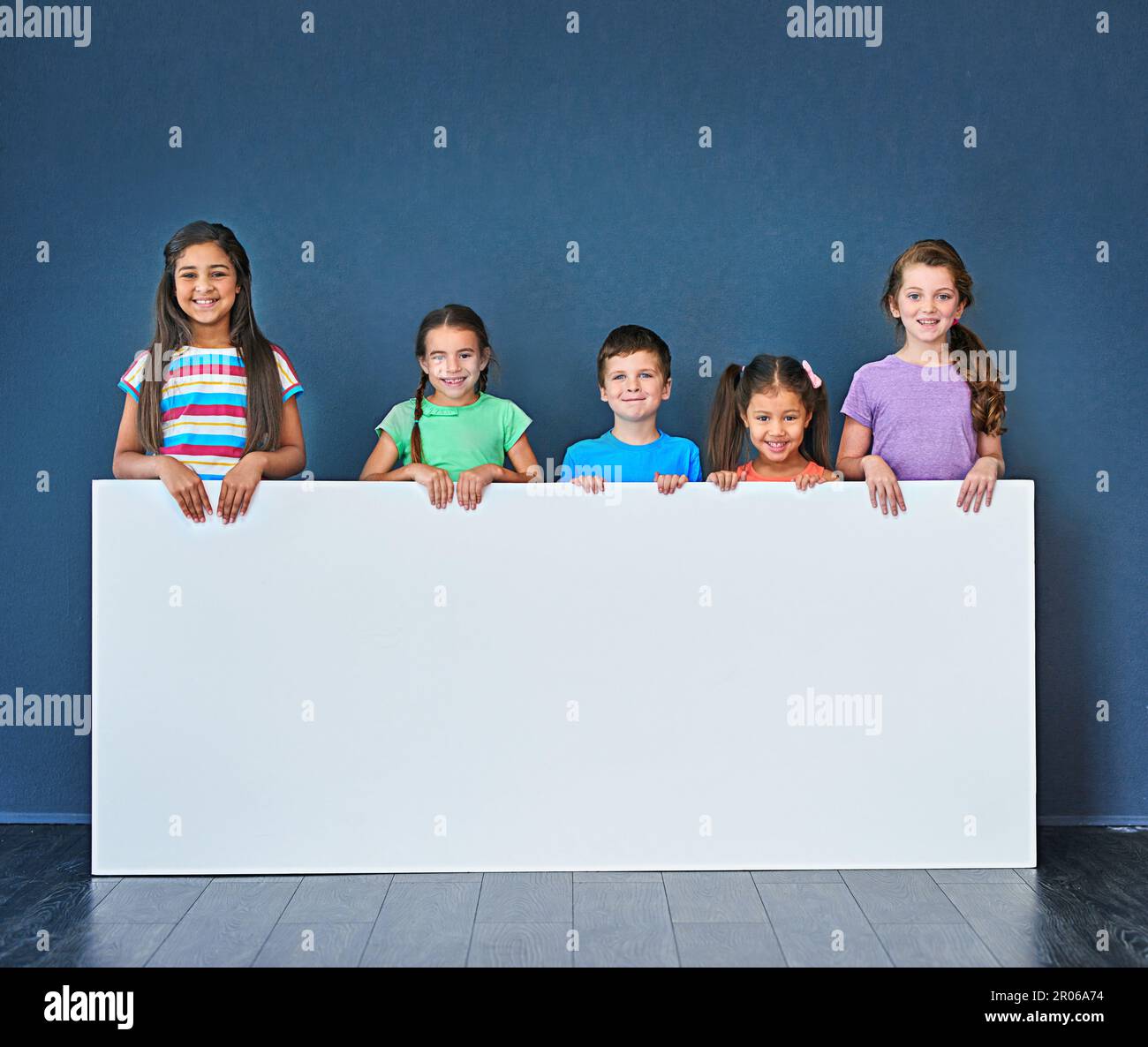 Just for the kids. Studio shot of a diverse group of kids standing ...