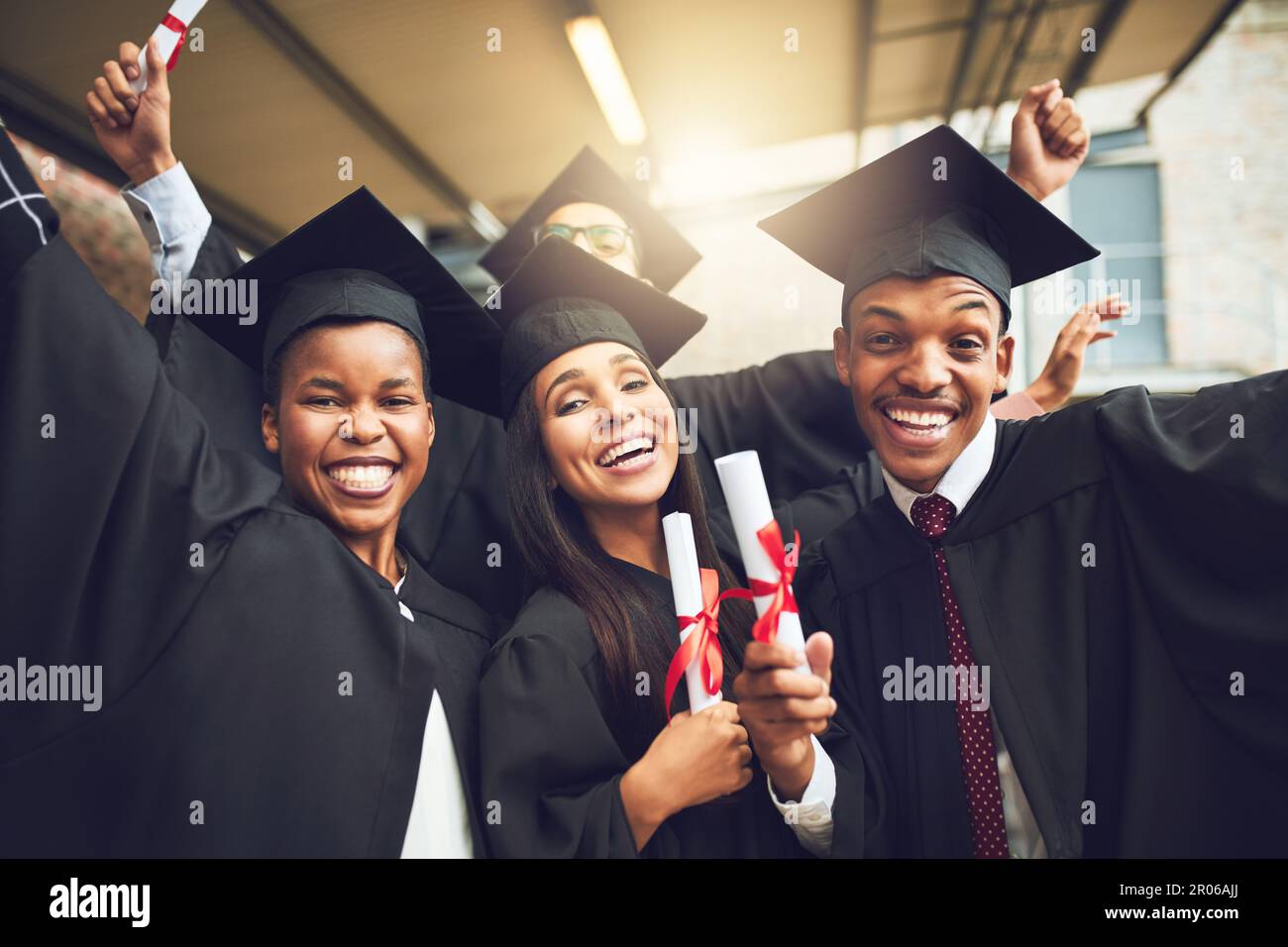Let the celebrating begin. a group of fellow students standing together ...