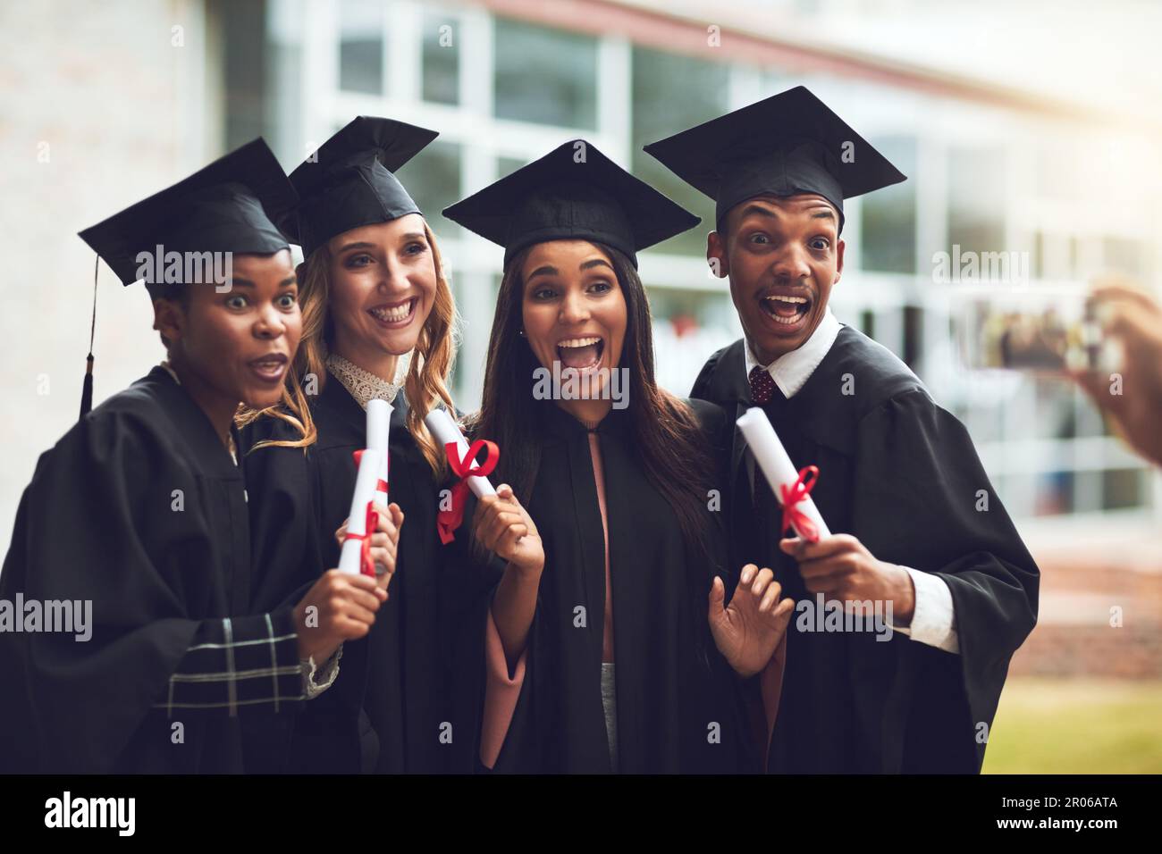 Hard work gets you hard proof. a group of fellow students standing ...