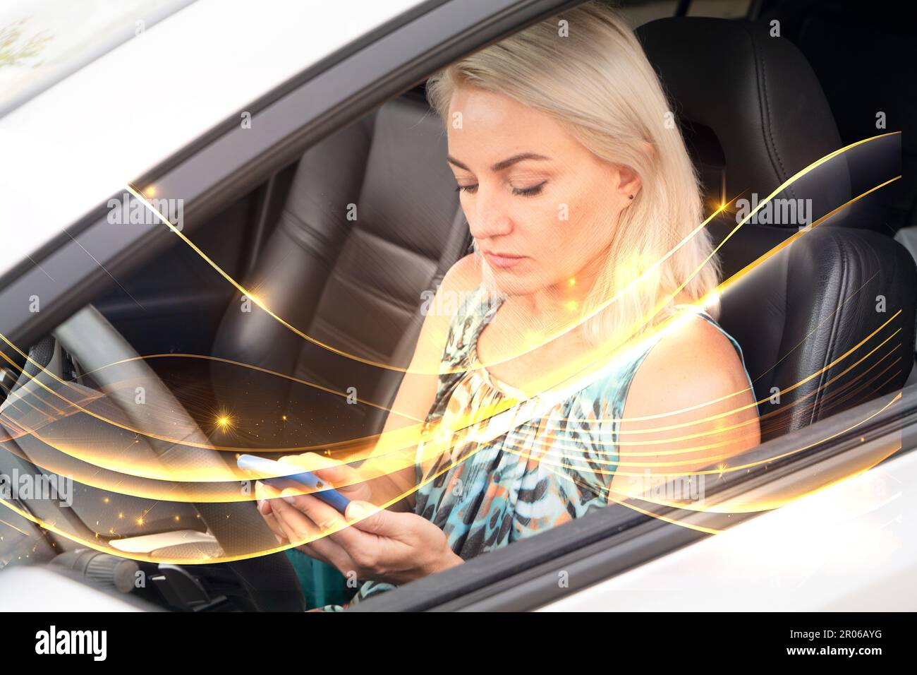 Women driving and texting car hi-res stock photography and images - Alamy