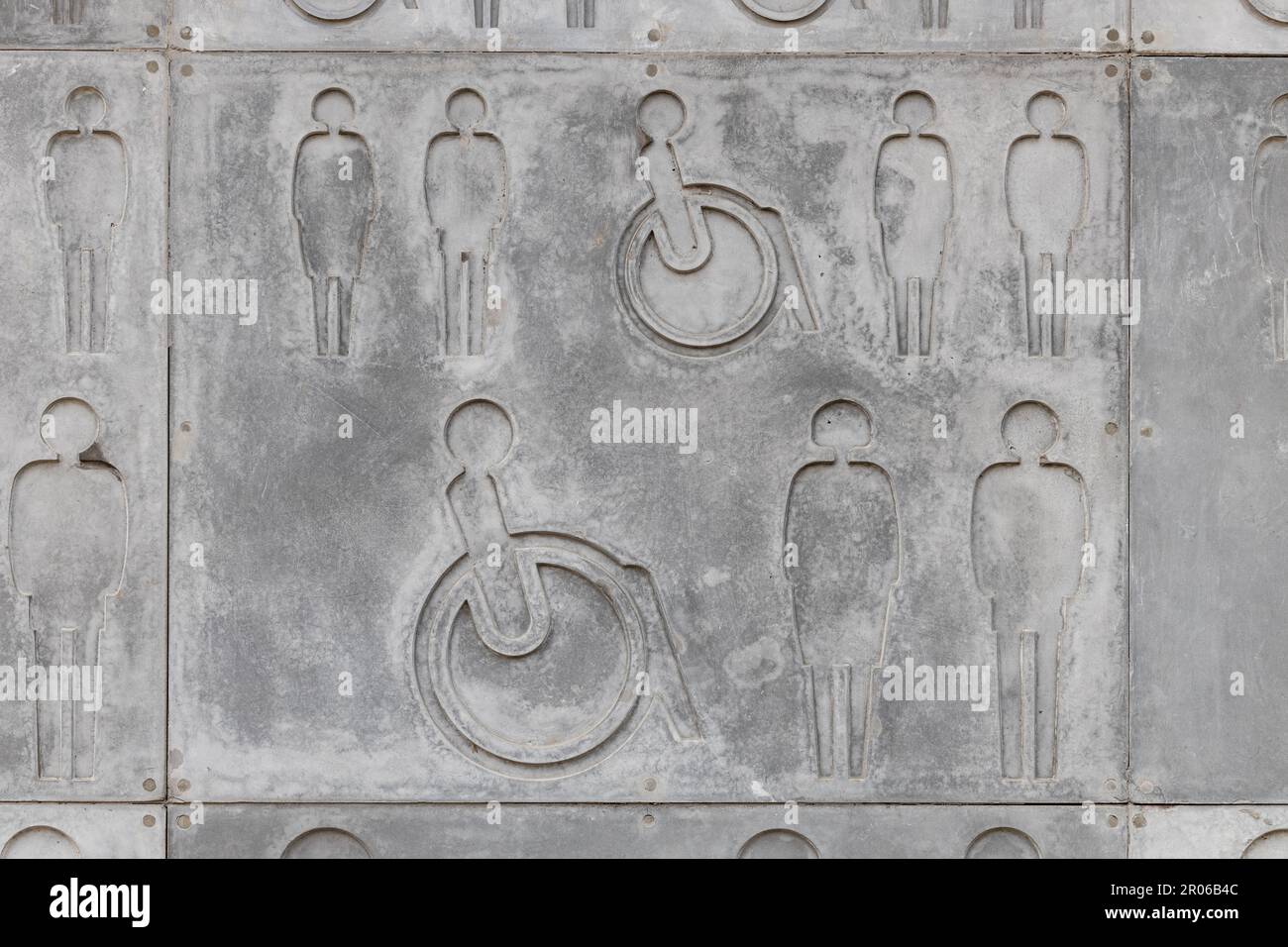 stone tiles with symbols of people of different status. symbol for a ...