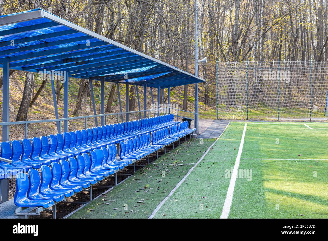 empty tribune on a deserted football field. empty football field Stock ...