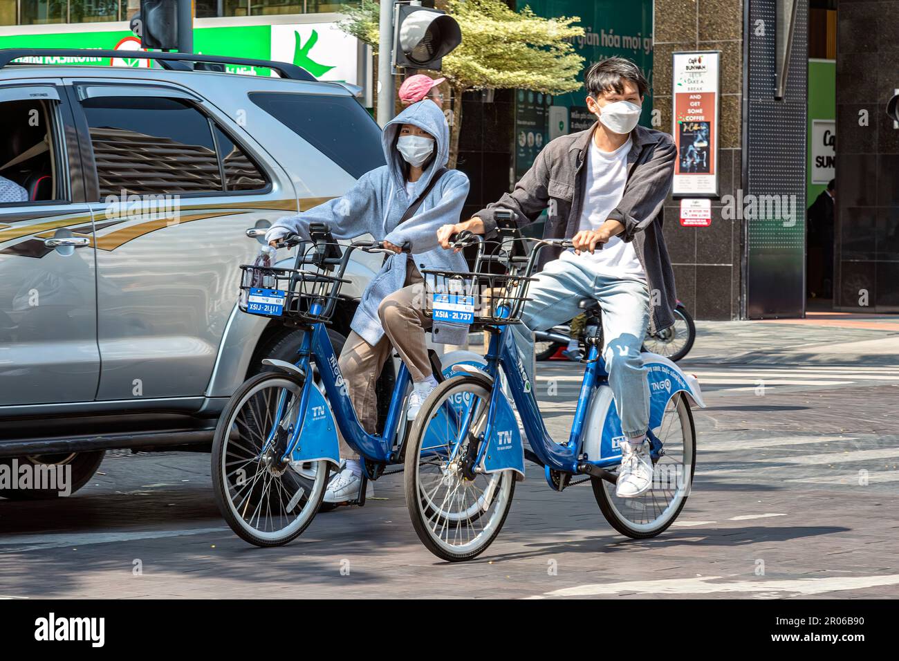 Woman riding an ebike hi-res stock photography and images - Alamy