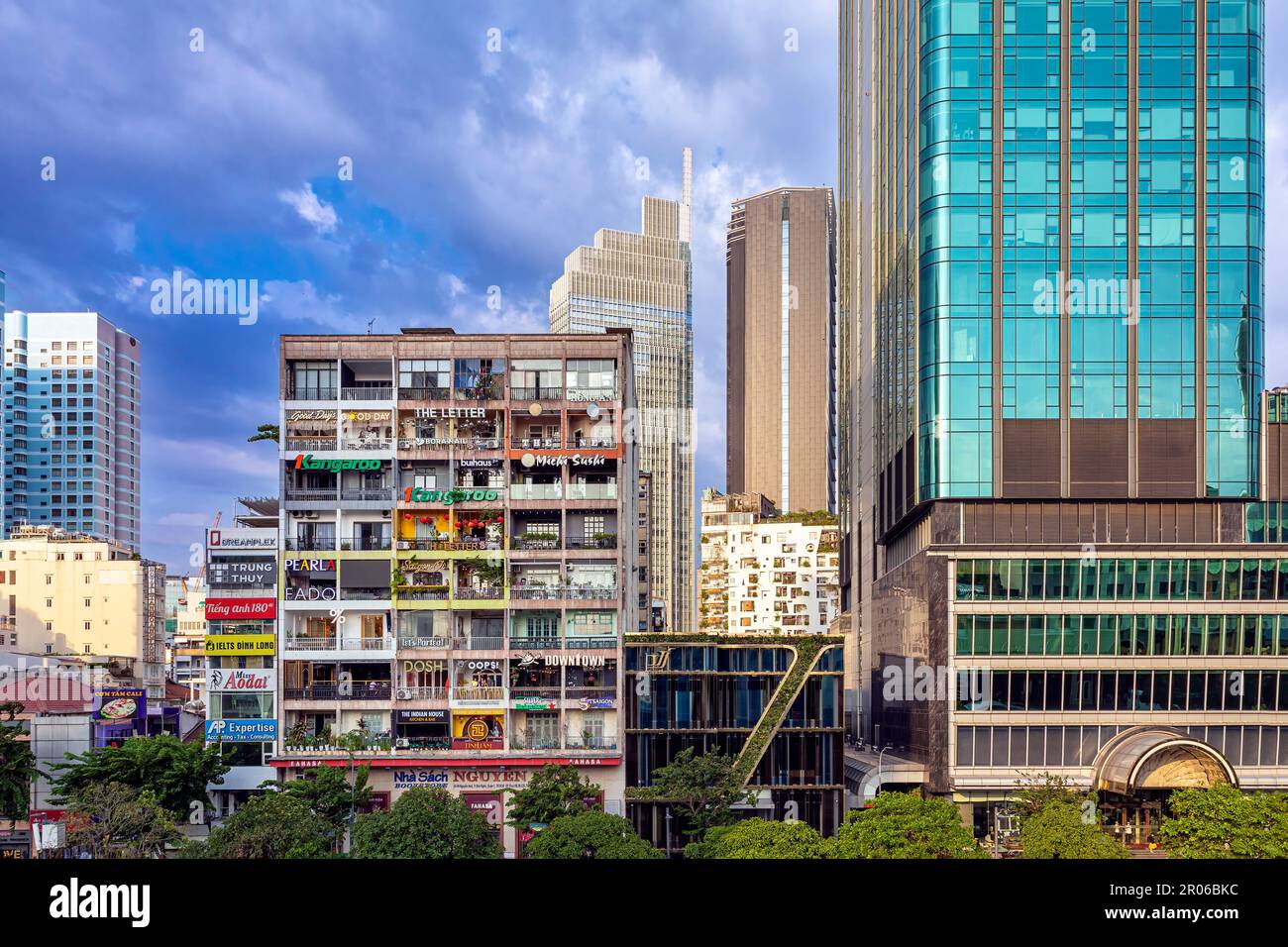 42 Nguyen Hue apartment building and new high rise offices frontage, Ho ...