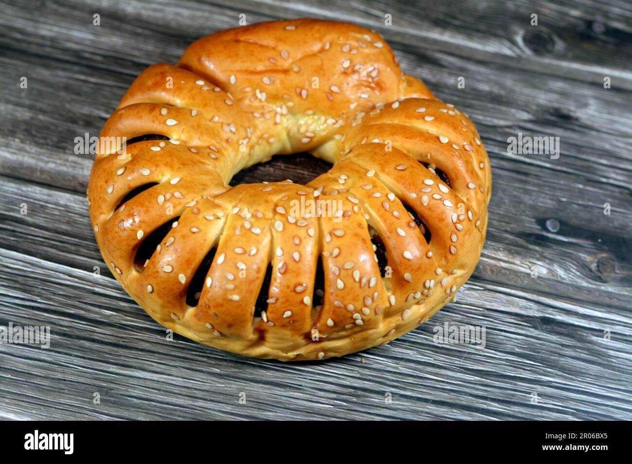 soft and chewy Date Filled Ajwa Agwa bun, golden-brown glaze dessert ...