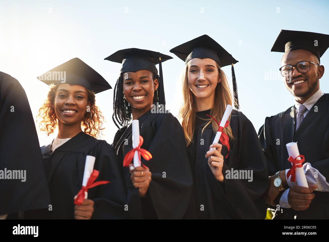 Dream big and work hard, always. a group of university graduates ...