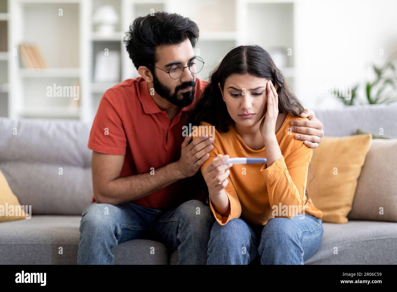 Infertility Problems. Portrait Of Upset Indian Couple Looking At ...