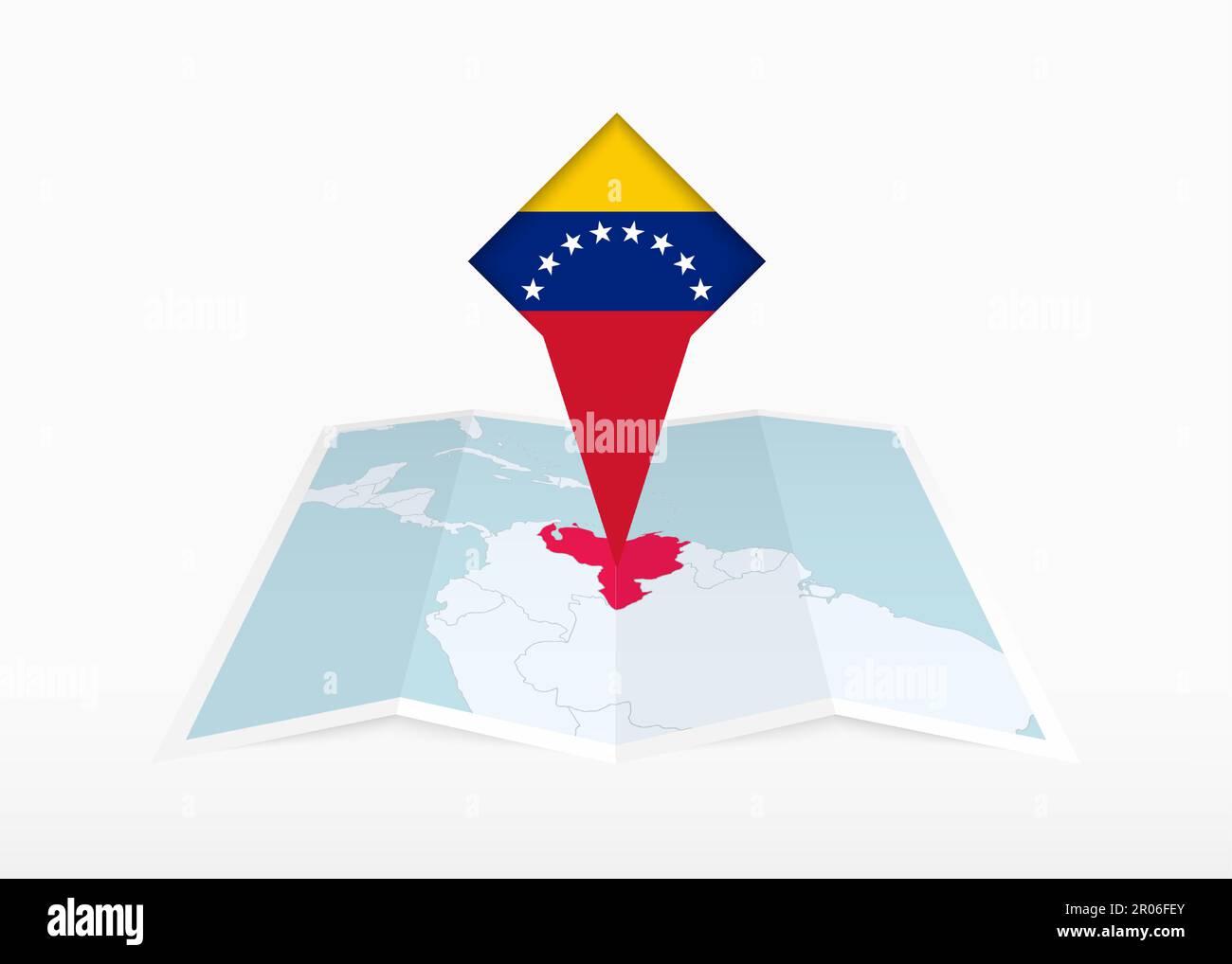 Venezuela is depicted on a folded paper map and pinned location marker ...